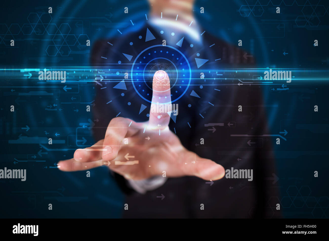 Handsome tech guy pressing high technology control panel screen concept ...