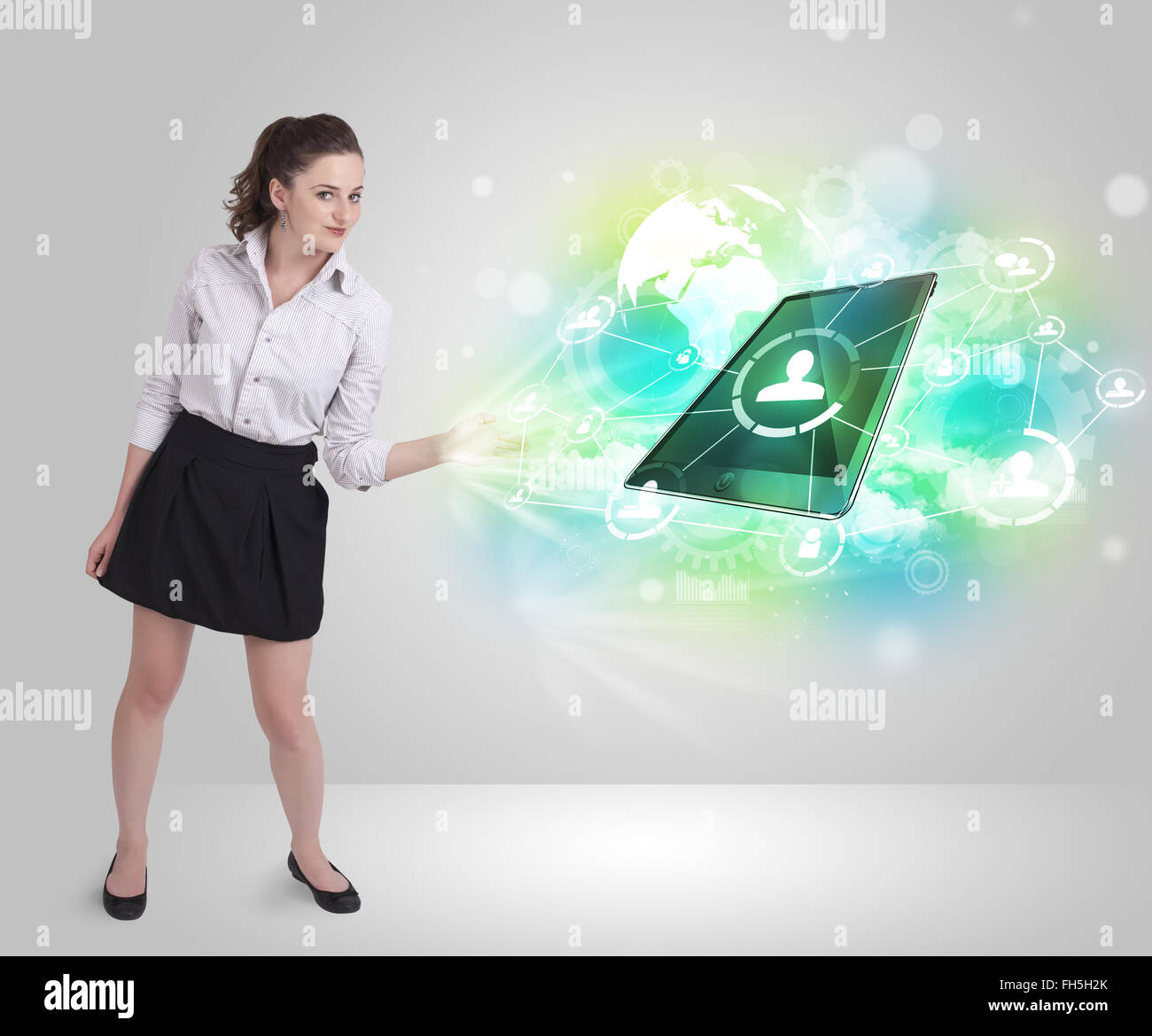 Business girl showing modern tablet technology concept Stock Photo - Alamy