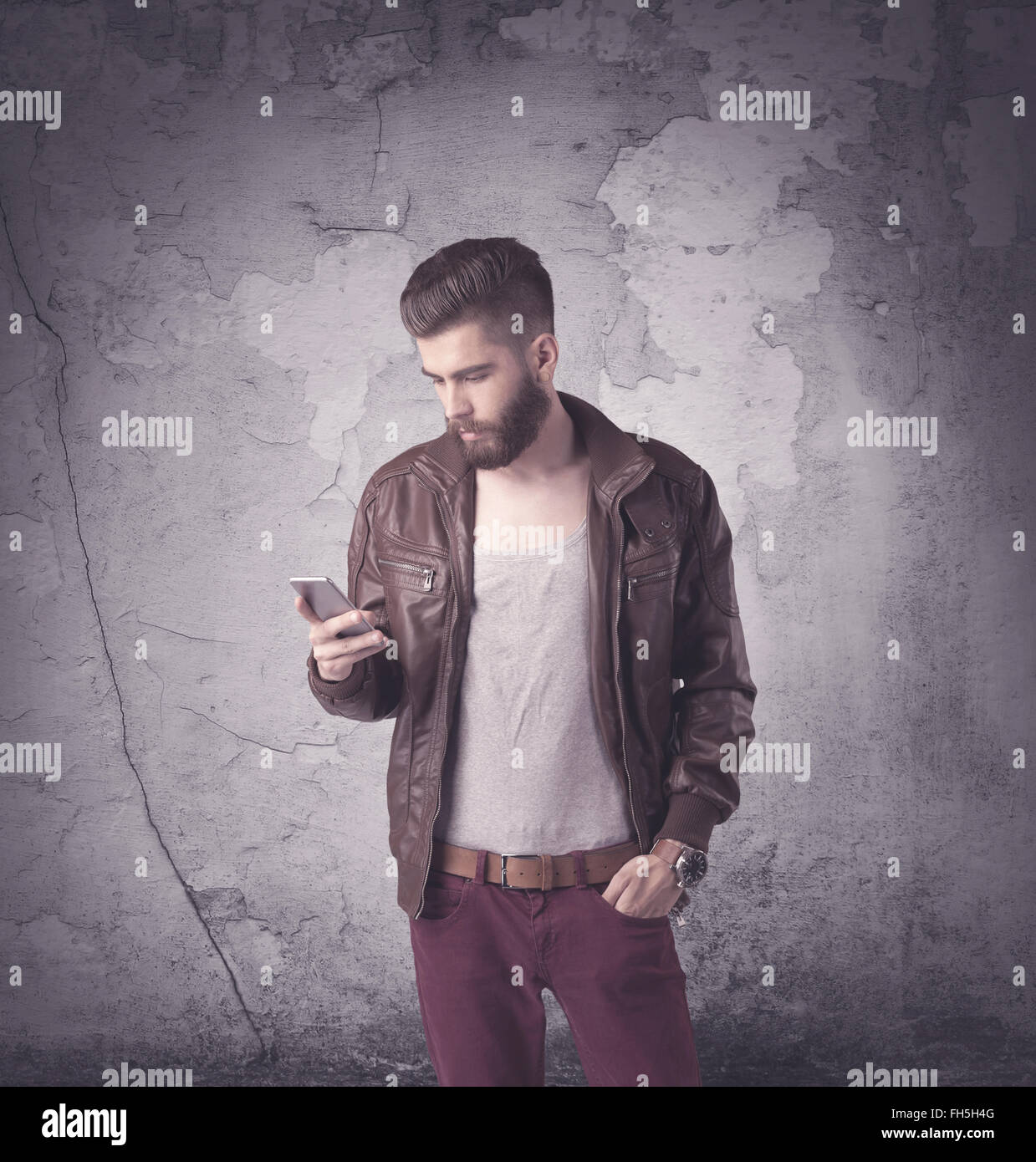 Handsome hipster in fashion clothing Stock Photo - Alamy