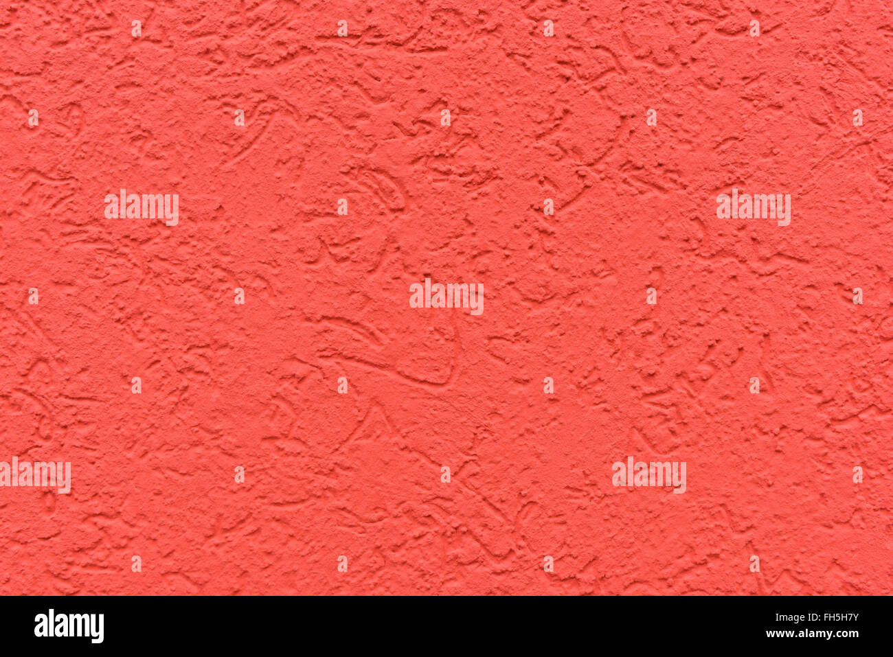 Close-up of painted, orange, exterior stone wall of house, Odenwald ...