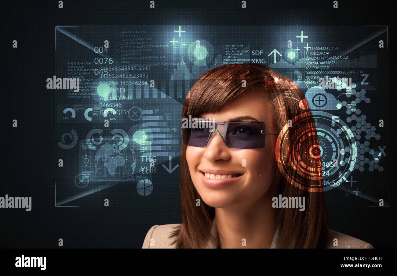 Young woman looking with futuristic smart high tech glasses Stock Photo ...