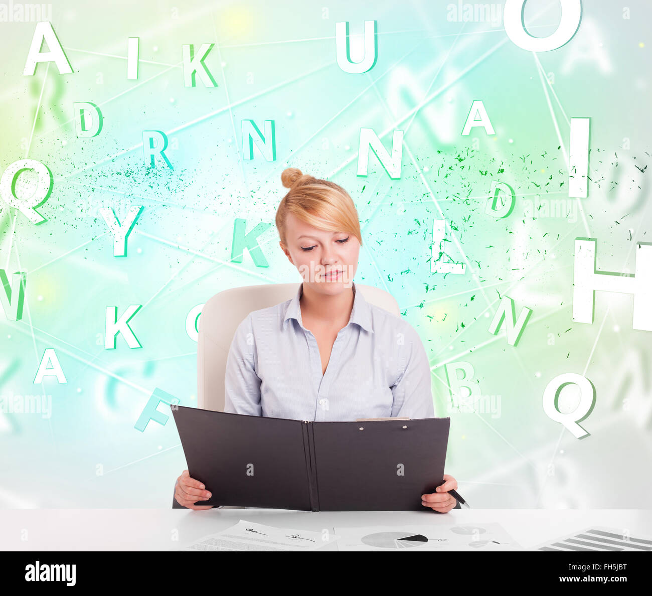 Business woman at desk with green word cloud Stock Photo - Alamy