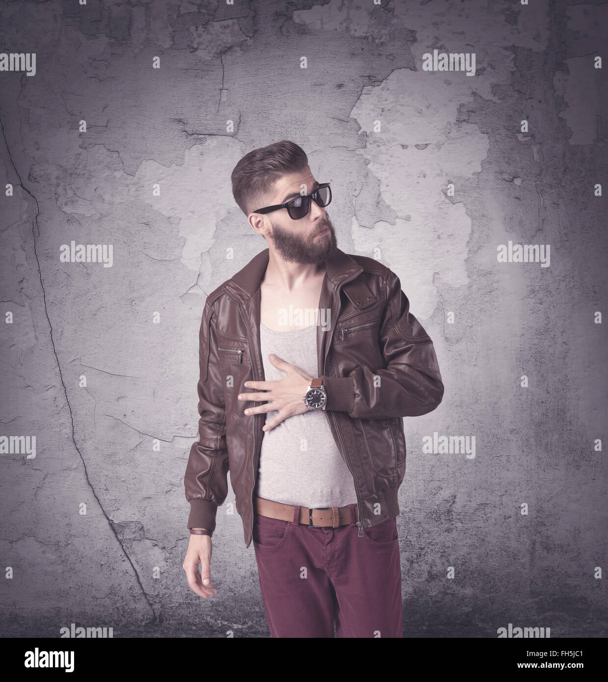 Handsome hipster in fashion clothing Stock Photo - Alamy