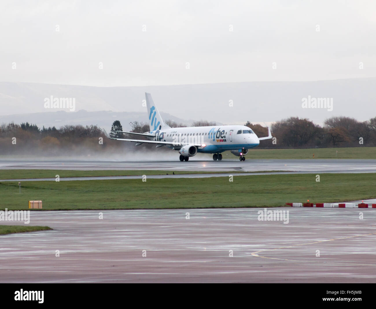 Flybe Embraer E175 narrow-body passenger plane (G-FBJB) taking off from ...