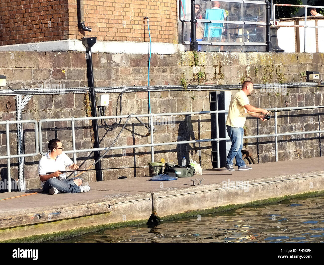 Two guys fishing hi-res stock photography and images - Alamy