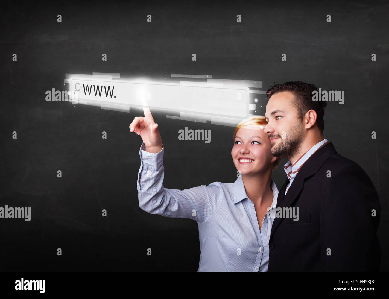 Young business couple touching web browser address bar with www sign ...