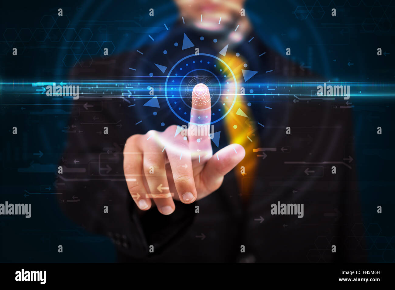 Handsome tech guy pressing high technology control panel screen concept ...