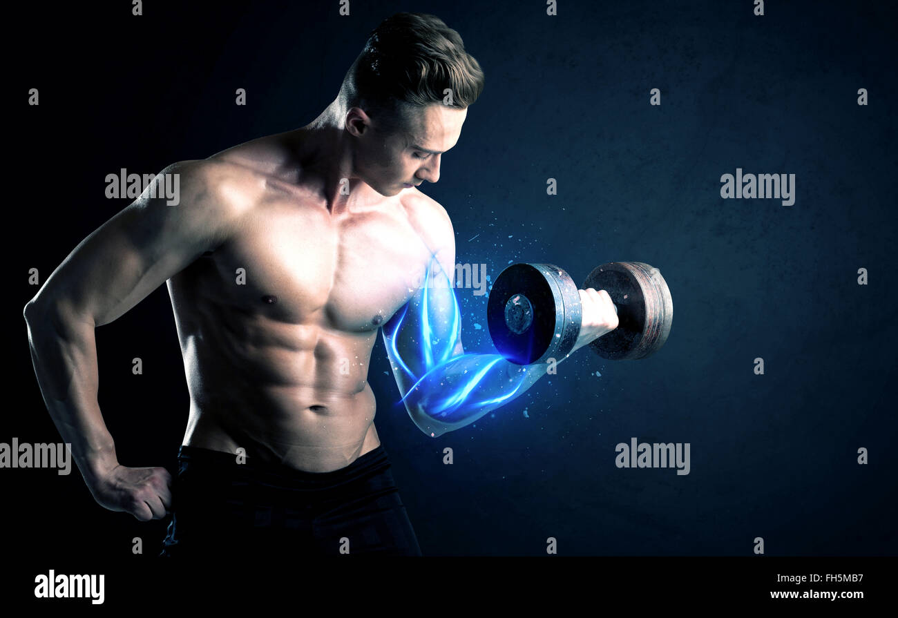 Fit athlete lifting weight with blue muscle light concept Stock Photo ...