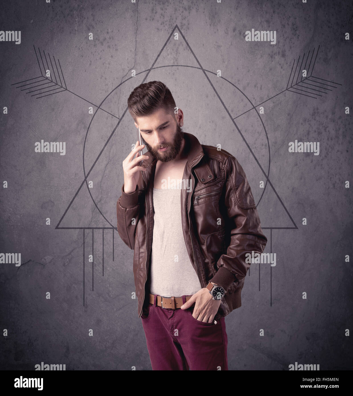 Casual funny male using mobile phone Stock Photo - Alamy