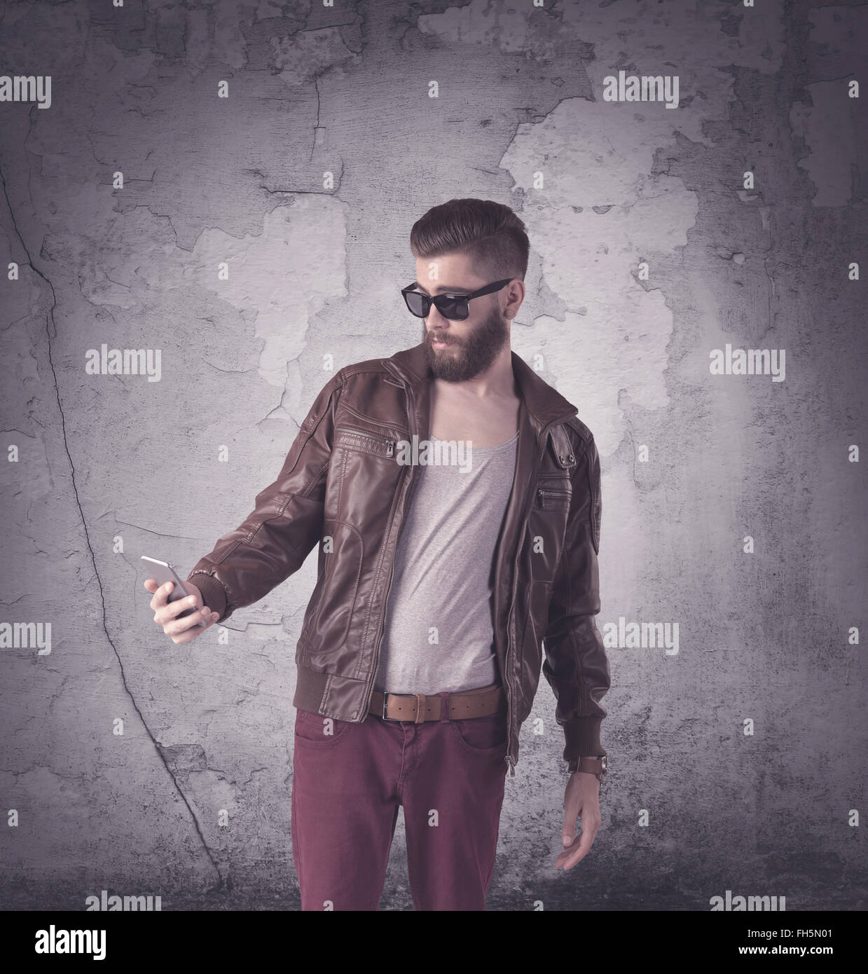 Handsome hipster in fashion clothing Stock Photo - Alamy