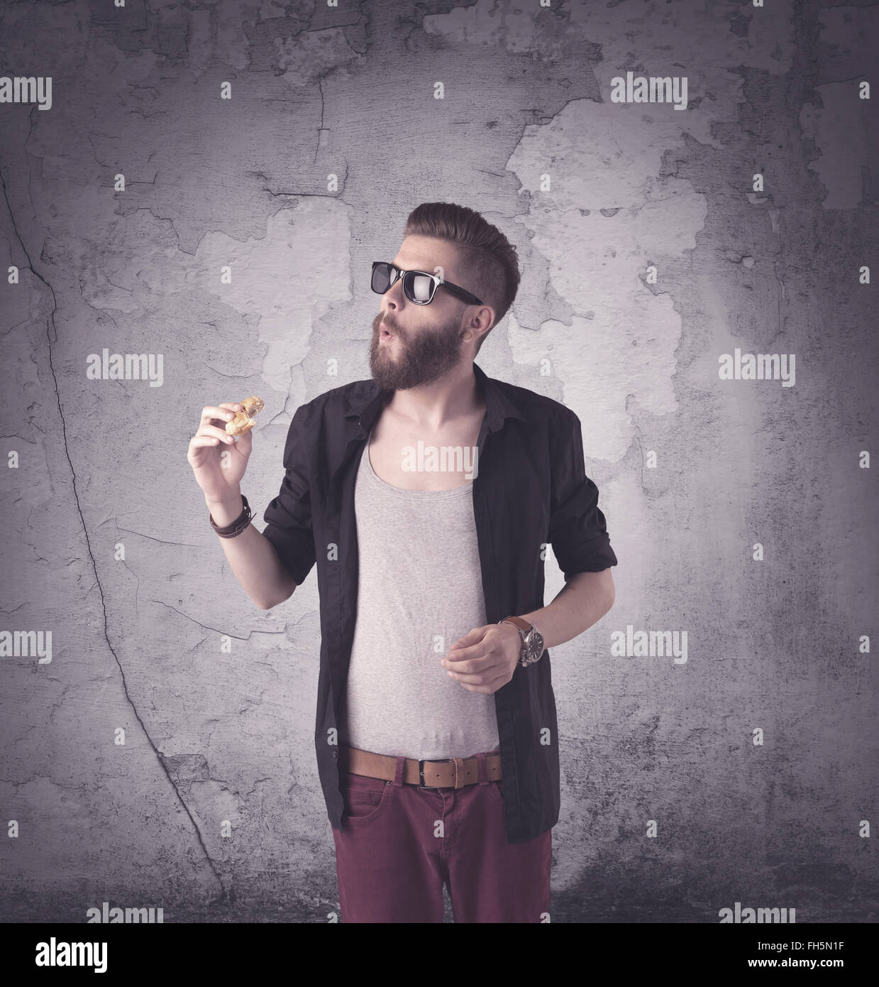 Handsome hipster in fashion clothing Stock Photo - Alamy