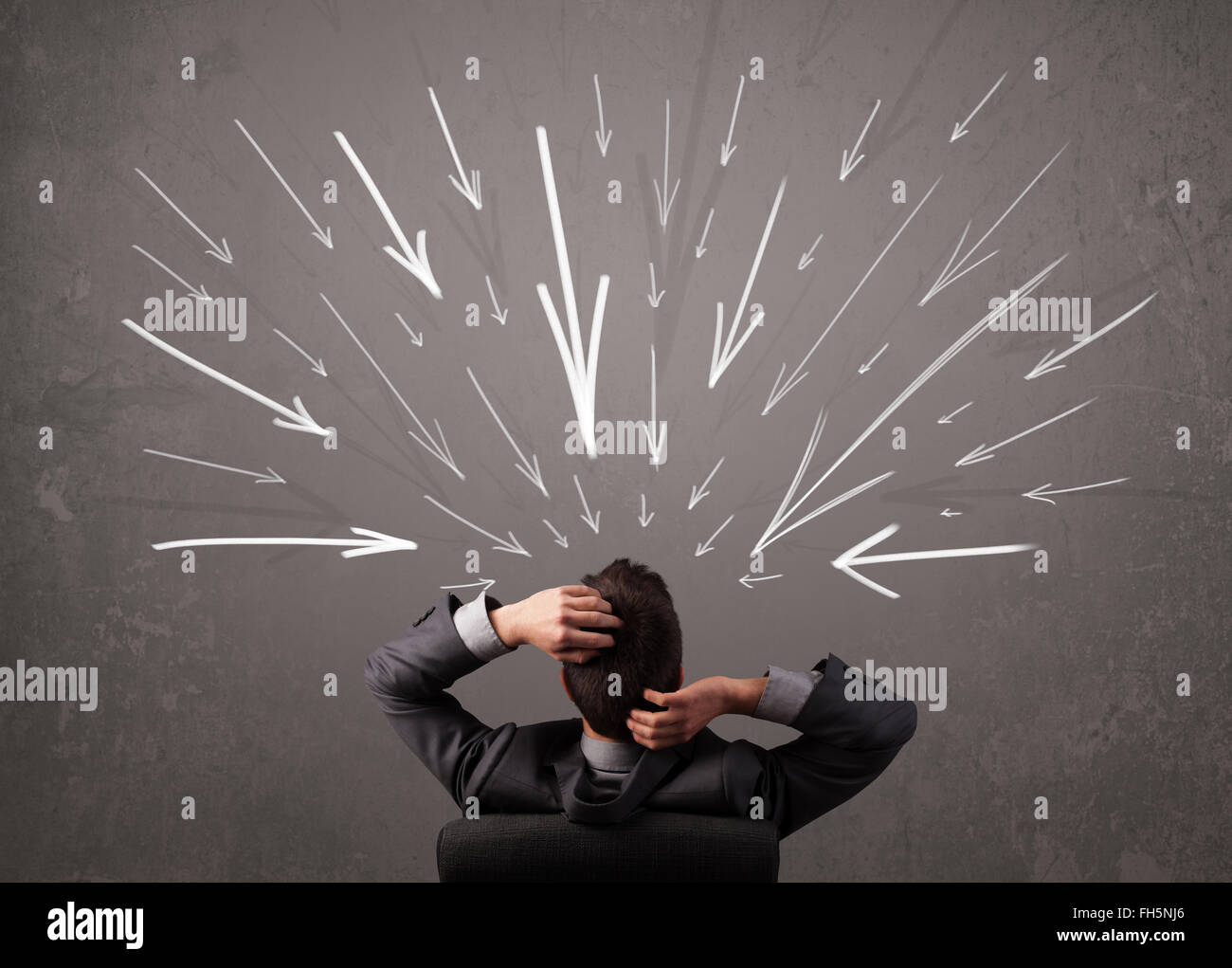 Business man with hand drawn arrows pointing at his head Stock Photo ...