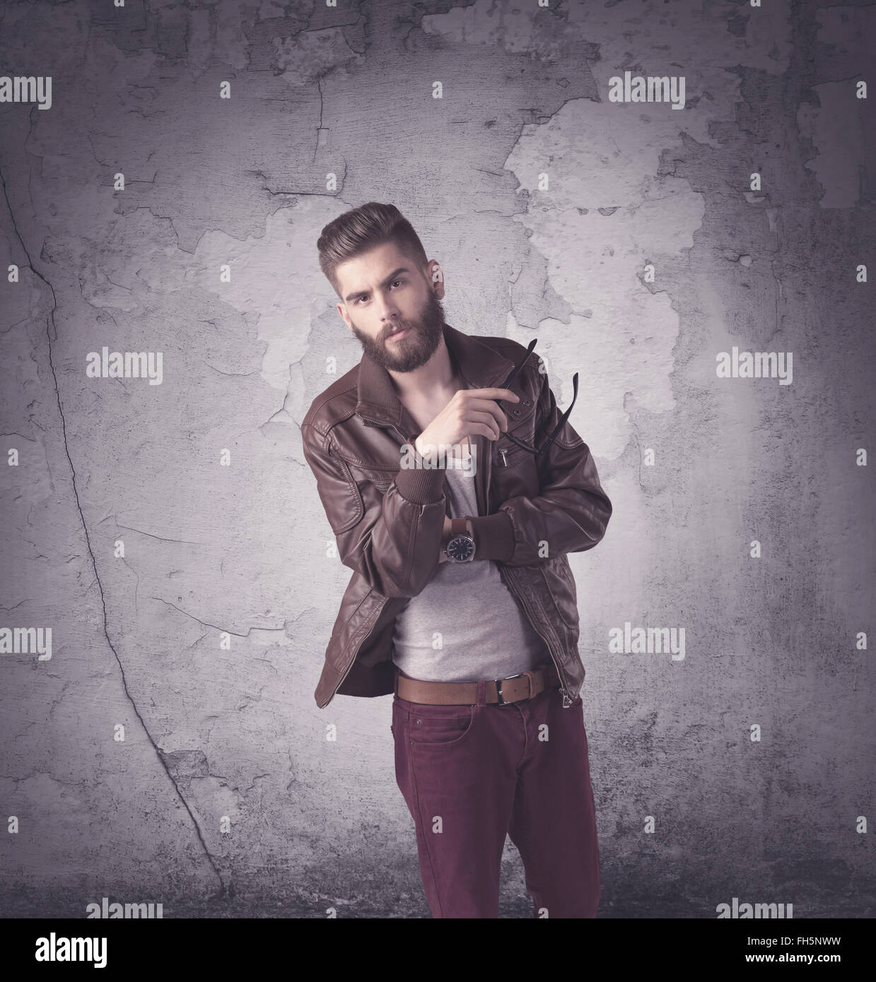 Handsome hipster in fashion clothing Stock Photo - Alamy