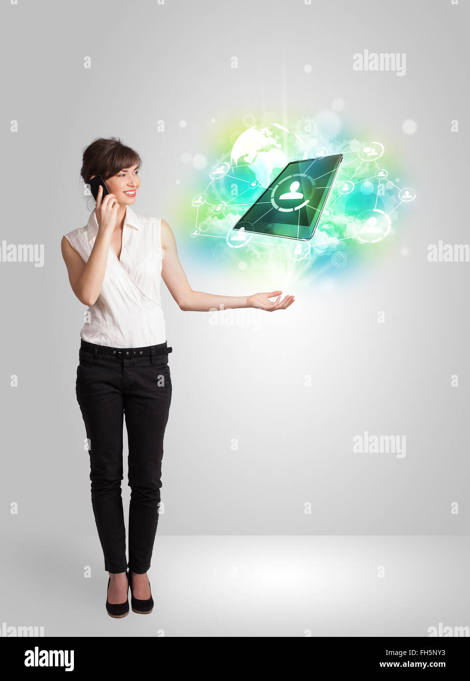 Business girl showing modern tablet technology concept Stock Photo - Alamy