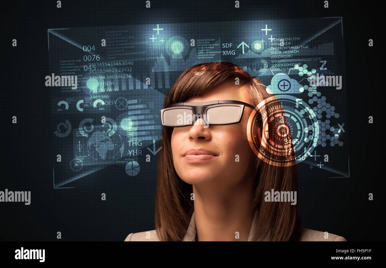 Young woman looking with futuristic smart high tech glasses Stock Photo ...