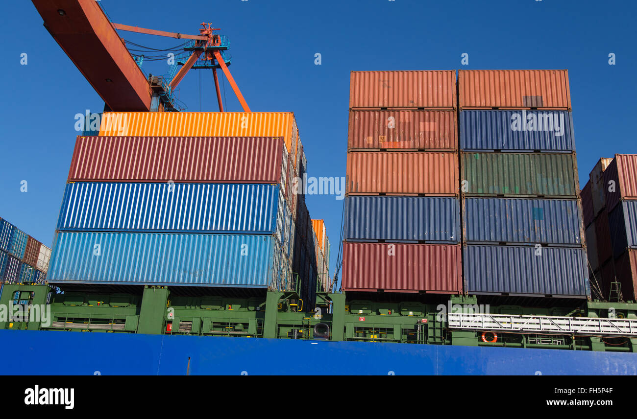 Container Ship is loading in a port Stock Photo - Alamy