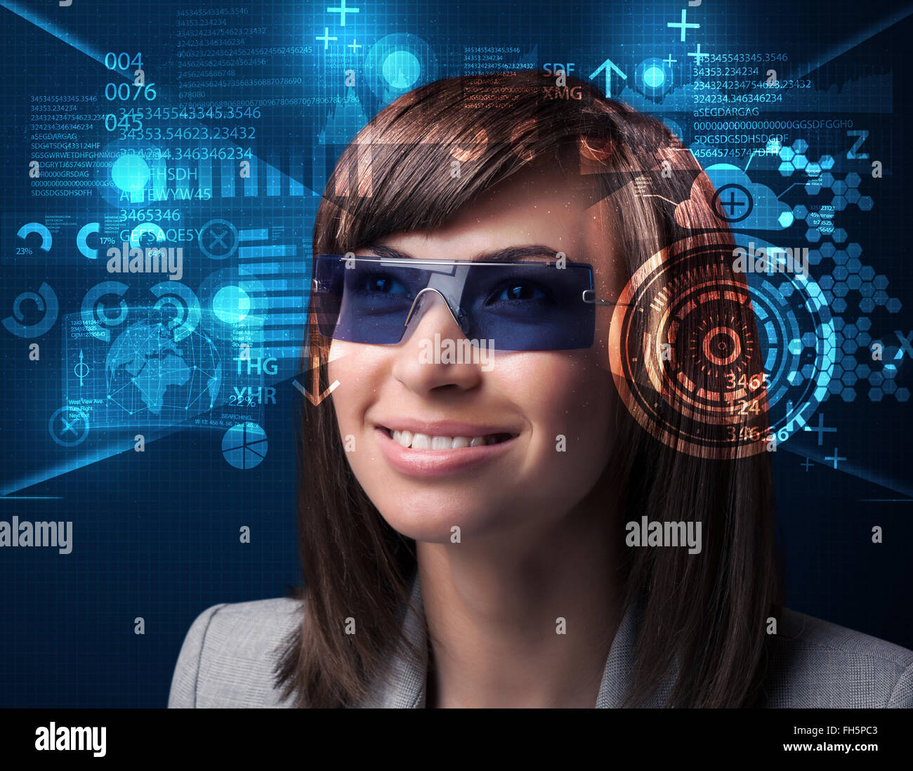 Young woman looking with futuristic smart high tech glasses Stock Photo ...