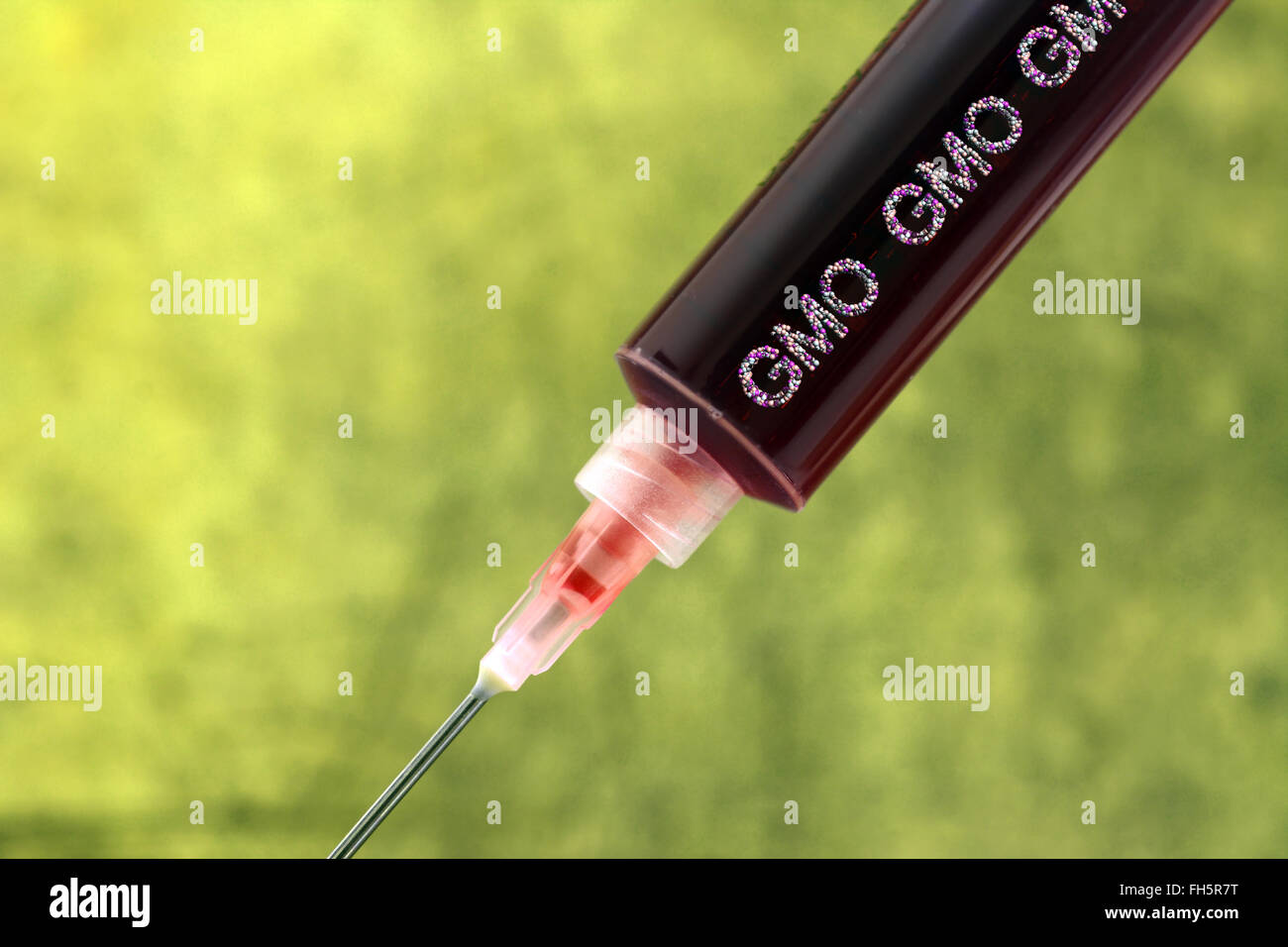 GMO syringe concept Stock Photo - Alamy