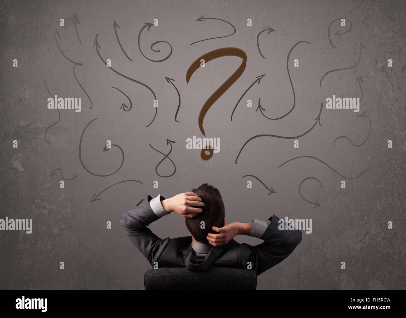 Business man looking at question mark sketch Stock Photo - Alamy