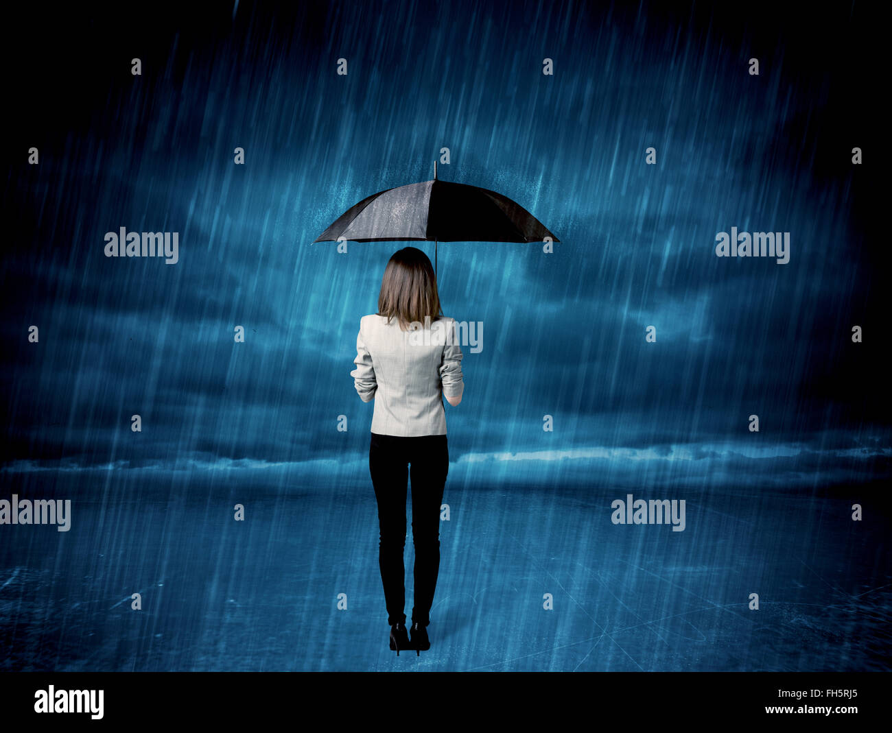 Standing in the rain sad hi-res stock photography and images - Alamy