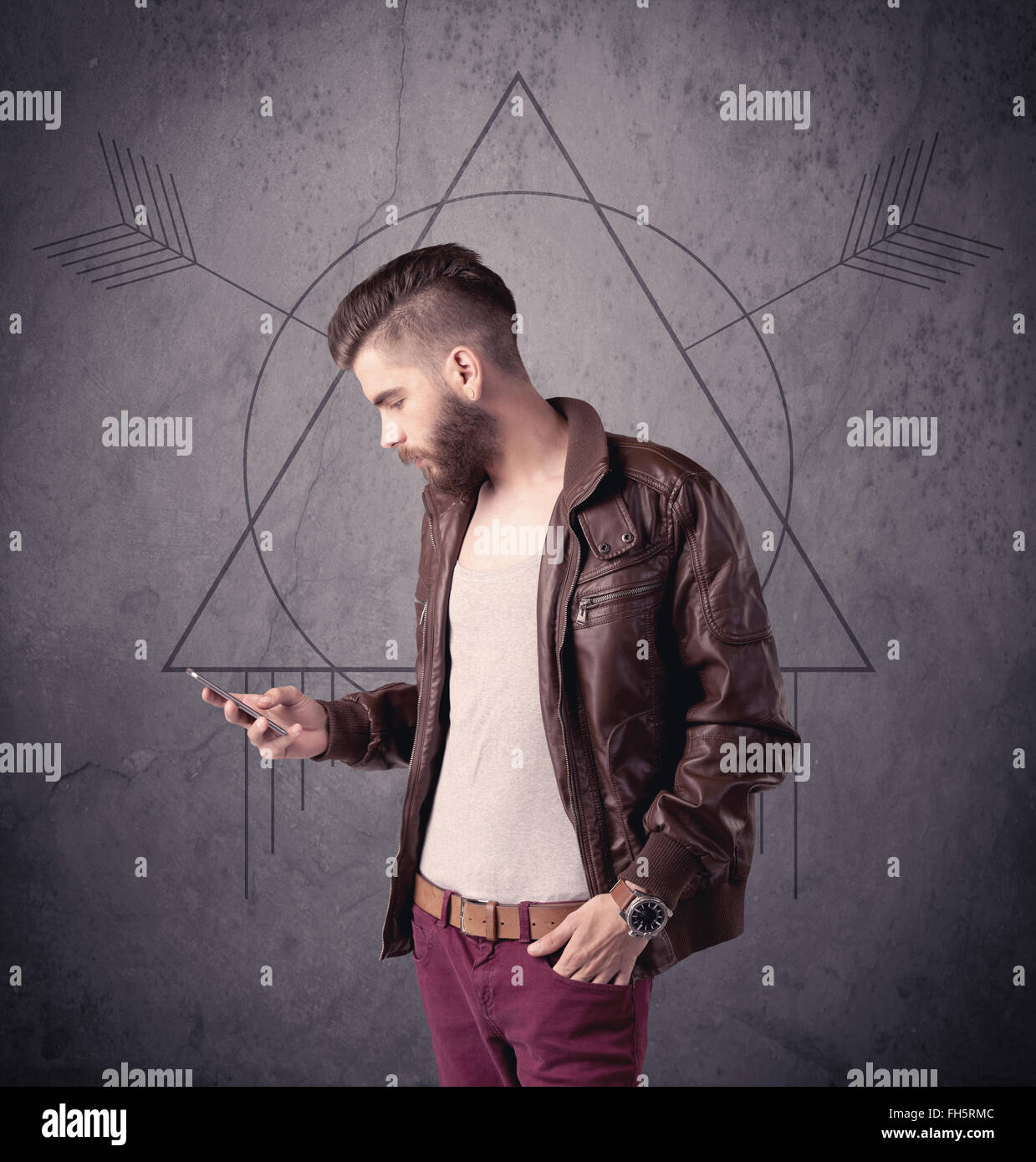 Casual funny male using mobile phone Stock Photo - Alamy
