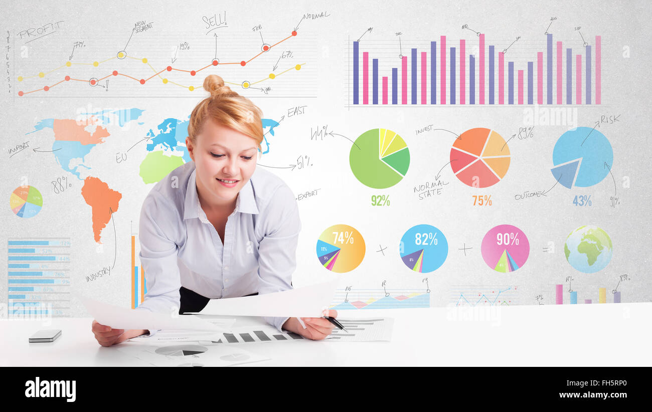 Business woman with colorful charts Stock Photo - Alamy