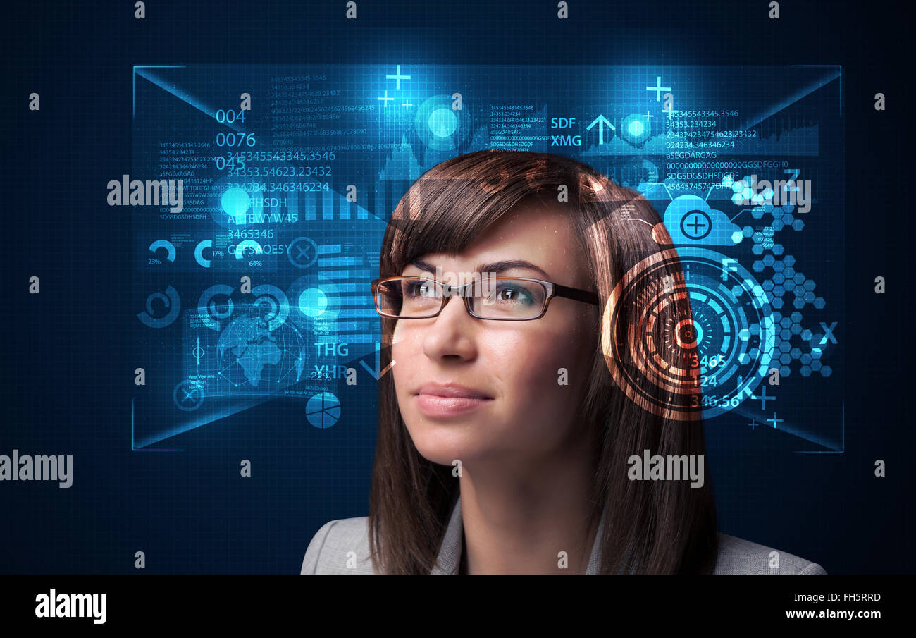 Young woman looking with futuristic smart high tech glasses Stock Photo ...