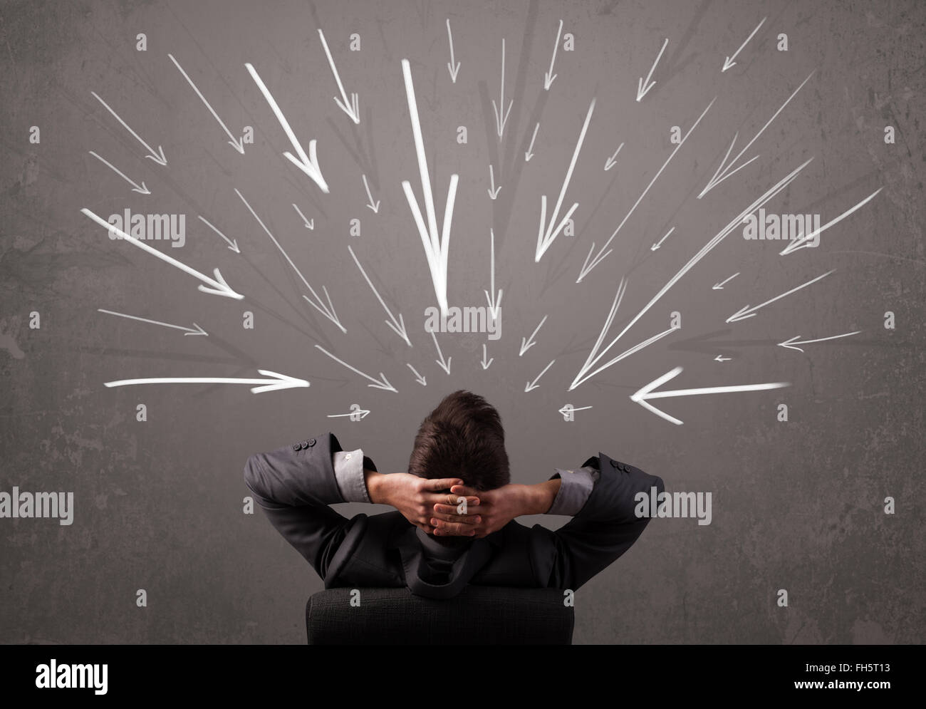 Business man with hand drawn arrows pointing at his head Stock Photo ...