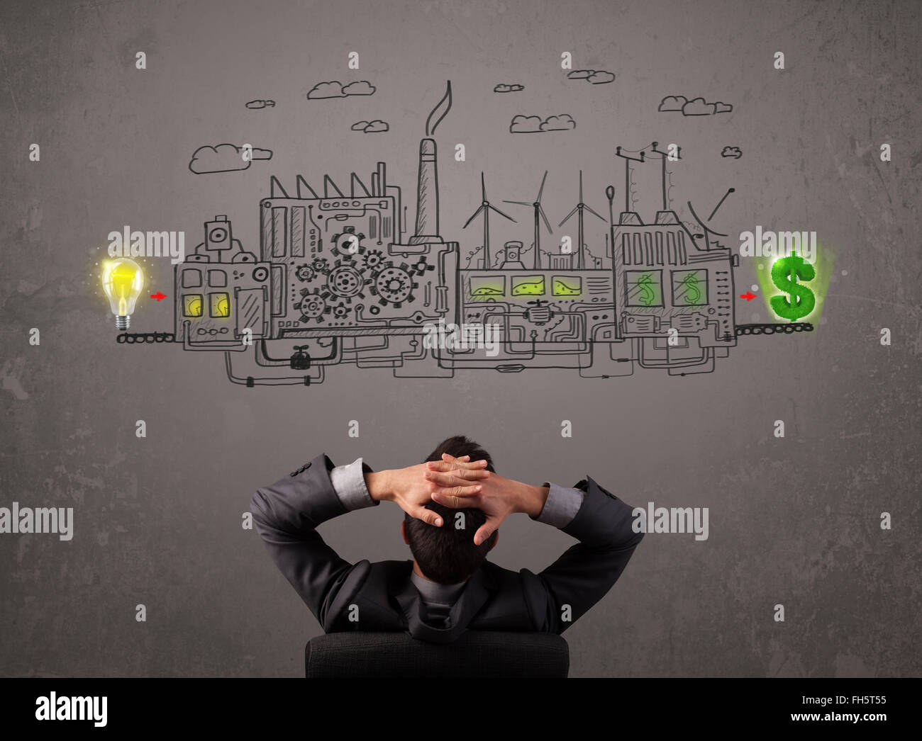 Business man looking at factory that makes money from ideas Stock Photo ...