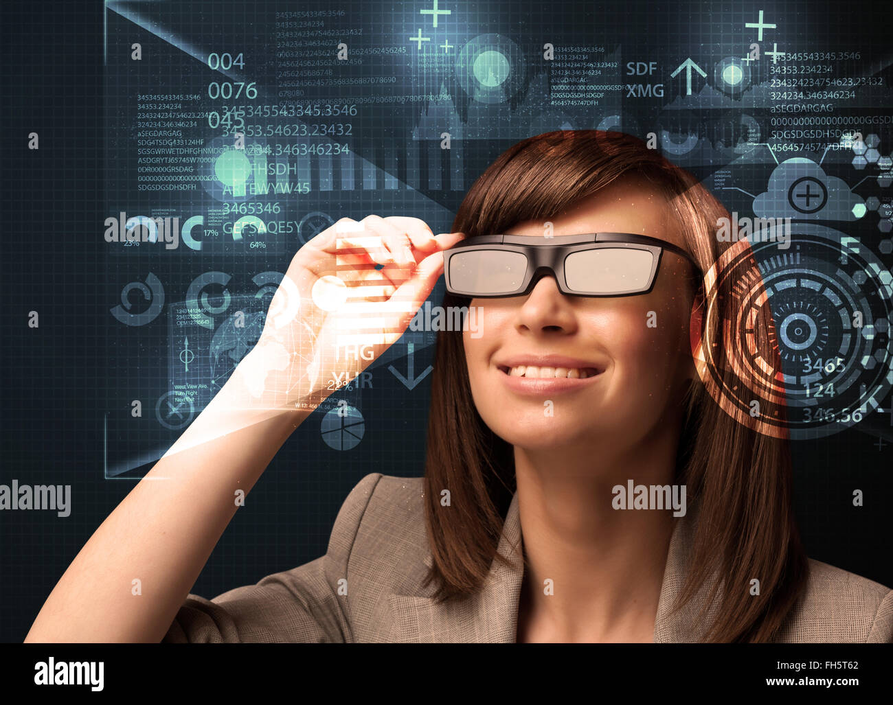 Young woman looking with futuristic smart high tech glasses Stock Photo ...