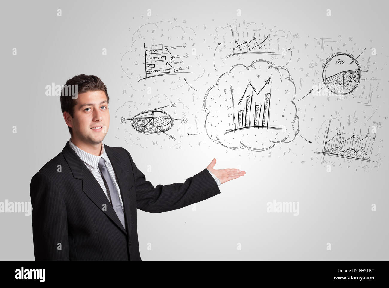 Business man presenting hand drawn sketch graphs and charts Stock Photo ...