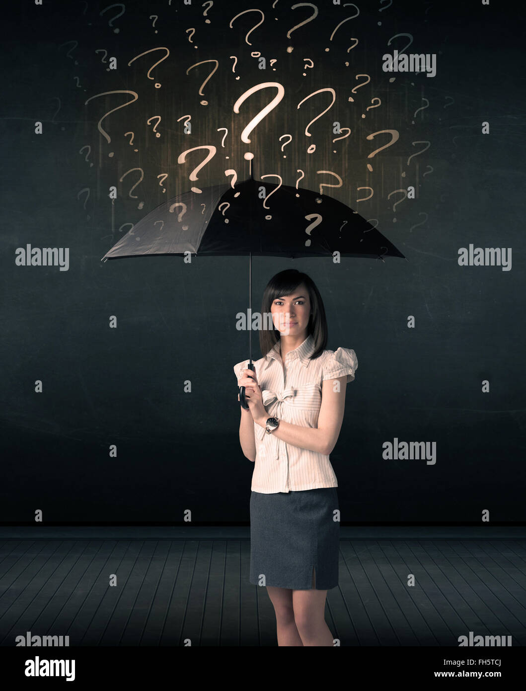 Businesswoman with umbrella and a lot of drawn question marks Stock ...