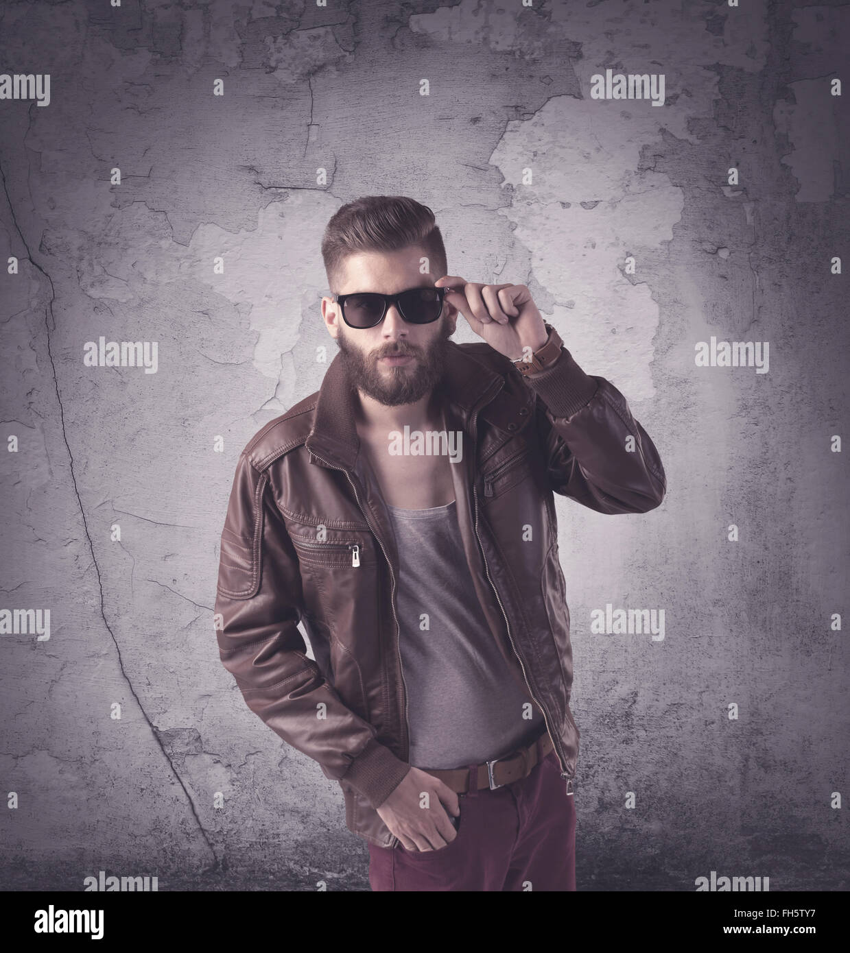 Handsome hipster in fashion clothing Stock Photo - Alamy