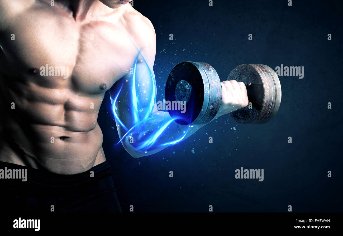 Fit athlete lifting weight with blue muscle light concept Stock Photo ...