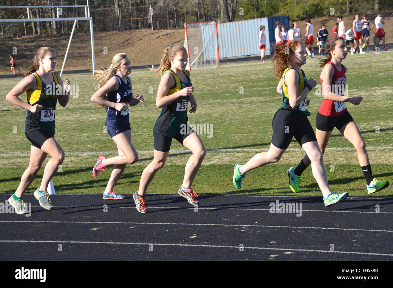 teenage girls run in a track meet Stock Photo - Alamy
