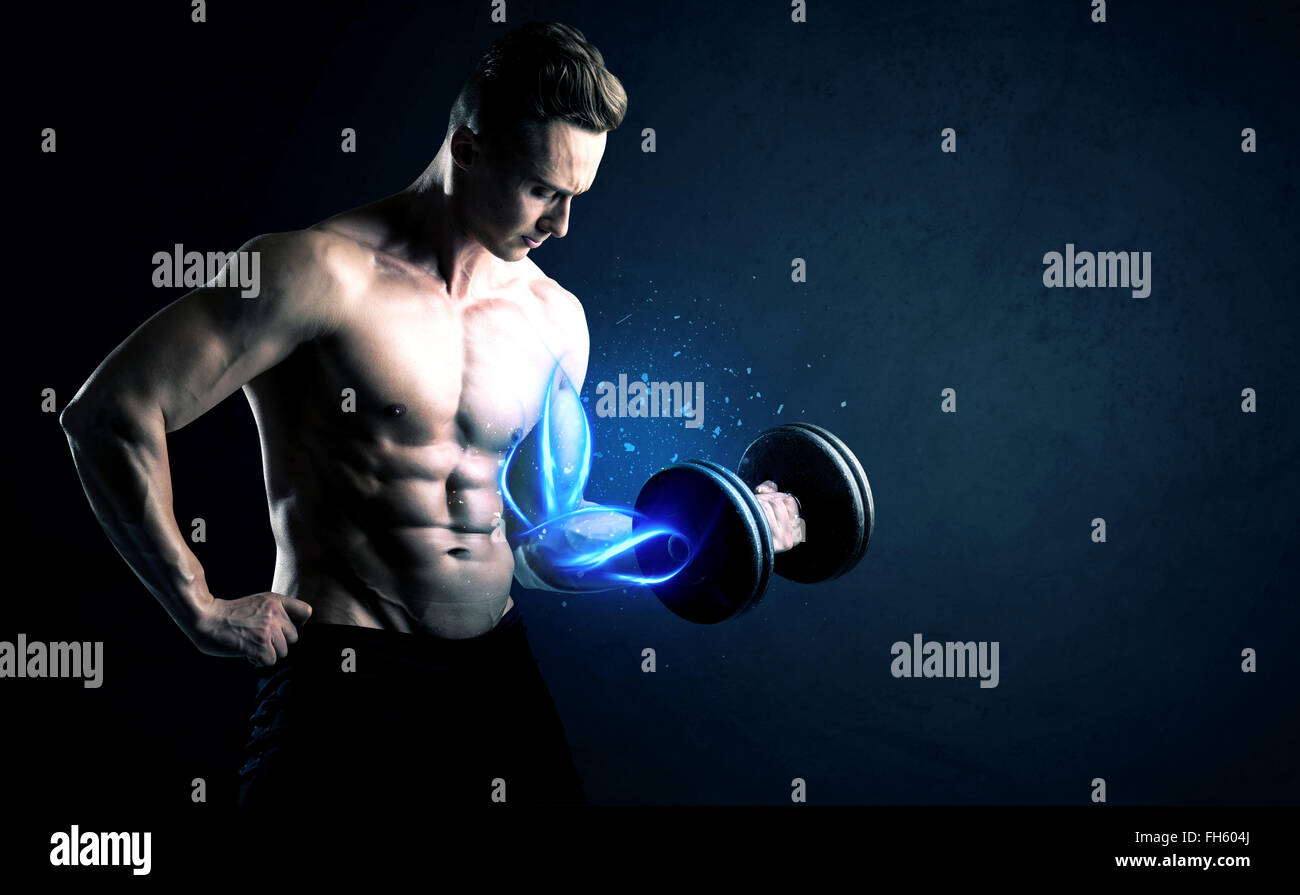 Fit athlete lifting weight with blue muscle light concept Stock Photo ...