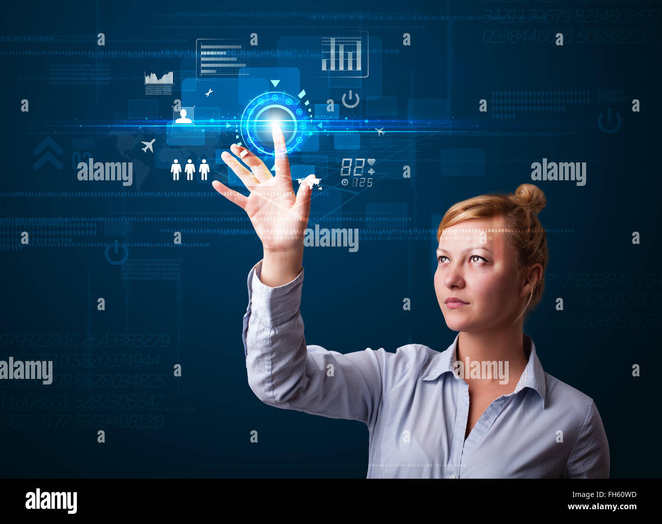Young business woman touching future web technology buttons and icons ...