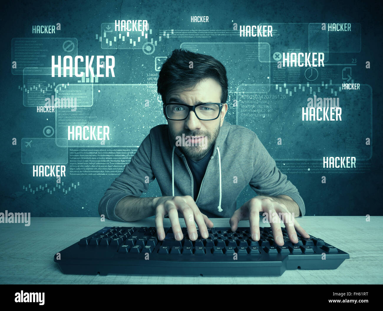 Hacker with keyboard and glasses Stock Photo - Alamy