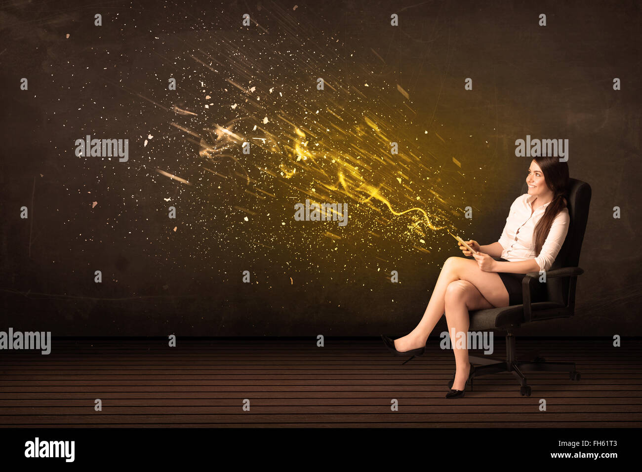 Businesswoman with tablet and energy explosion on background Stock ...