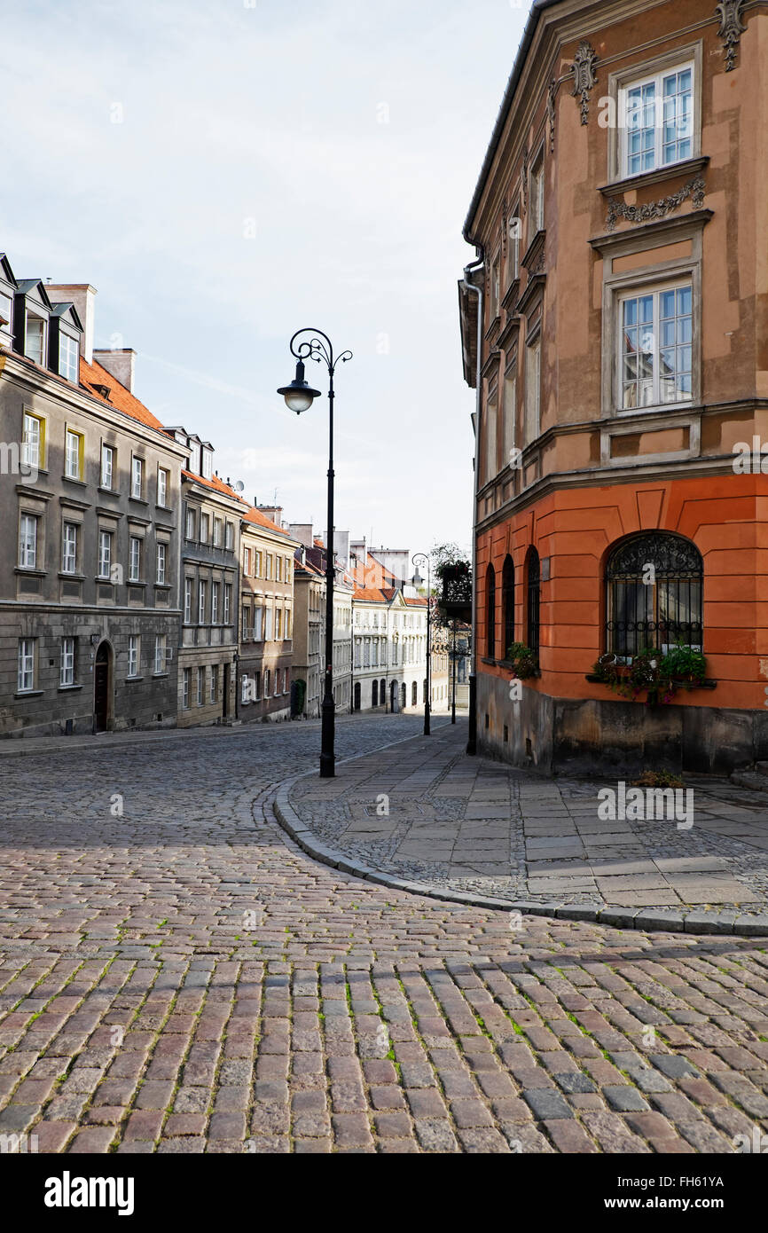 Old buildings and lamp post on cobblestone street corner, Old Town ...