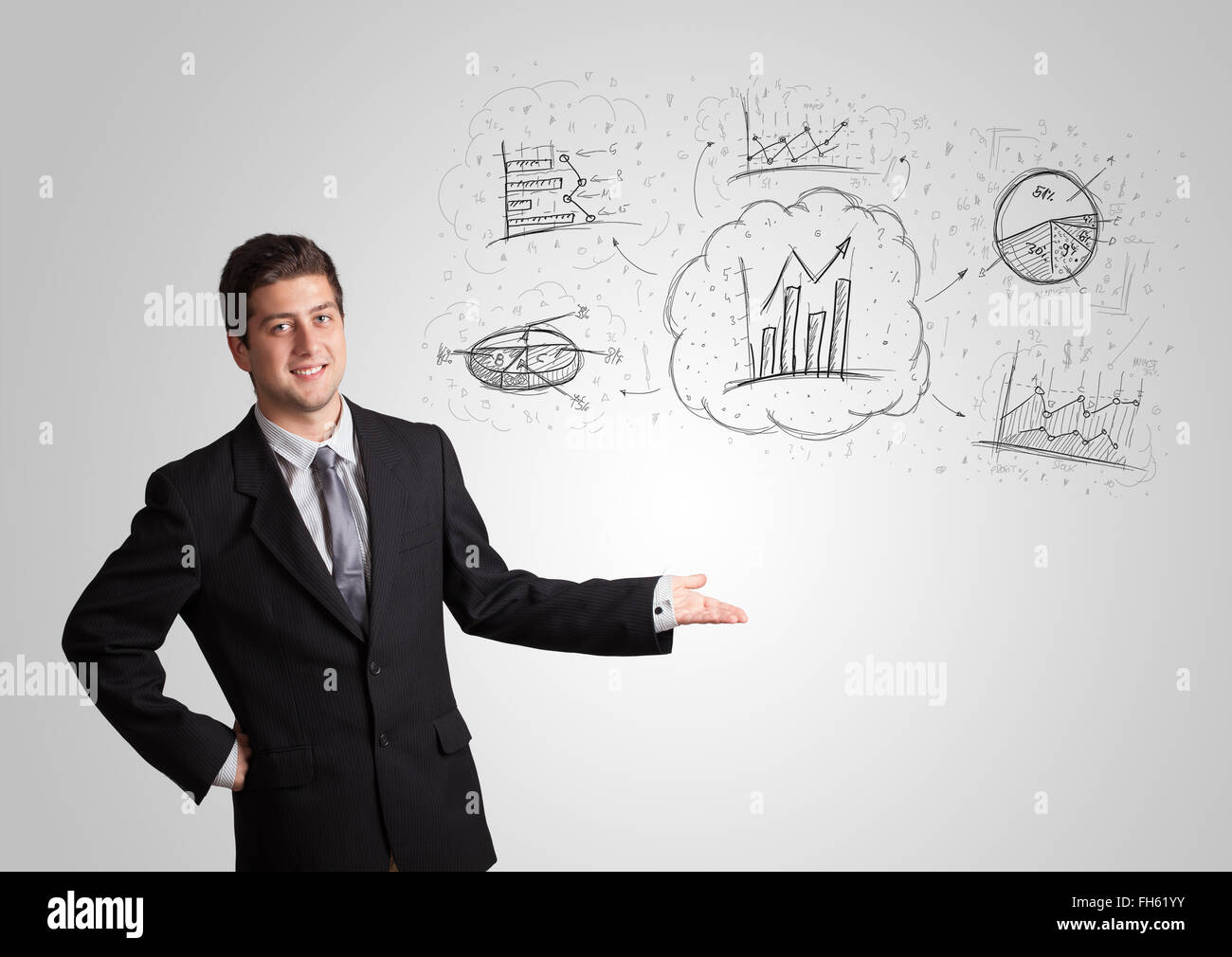 Business man presenting hand drawn sketch graphs and charts Stock Photo ...