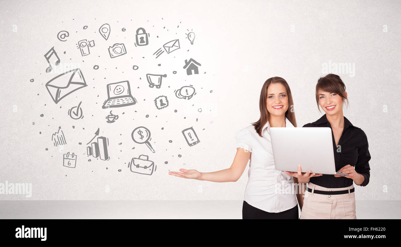 Young business woman presenting hand drawn media icons Stock Photo - Alamy