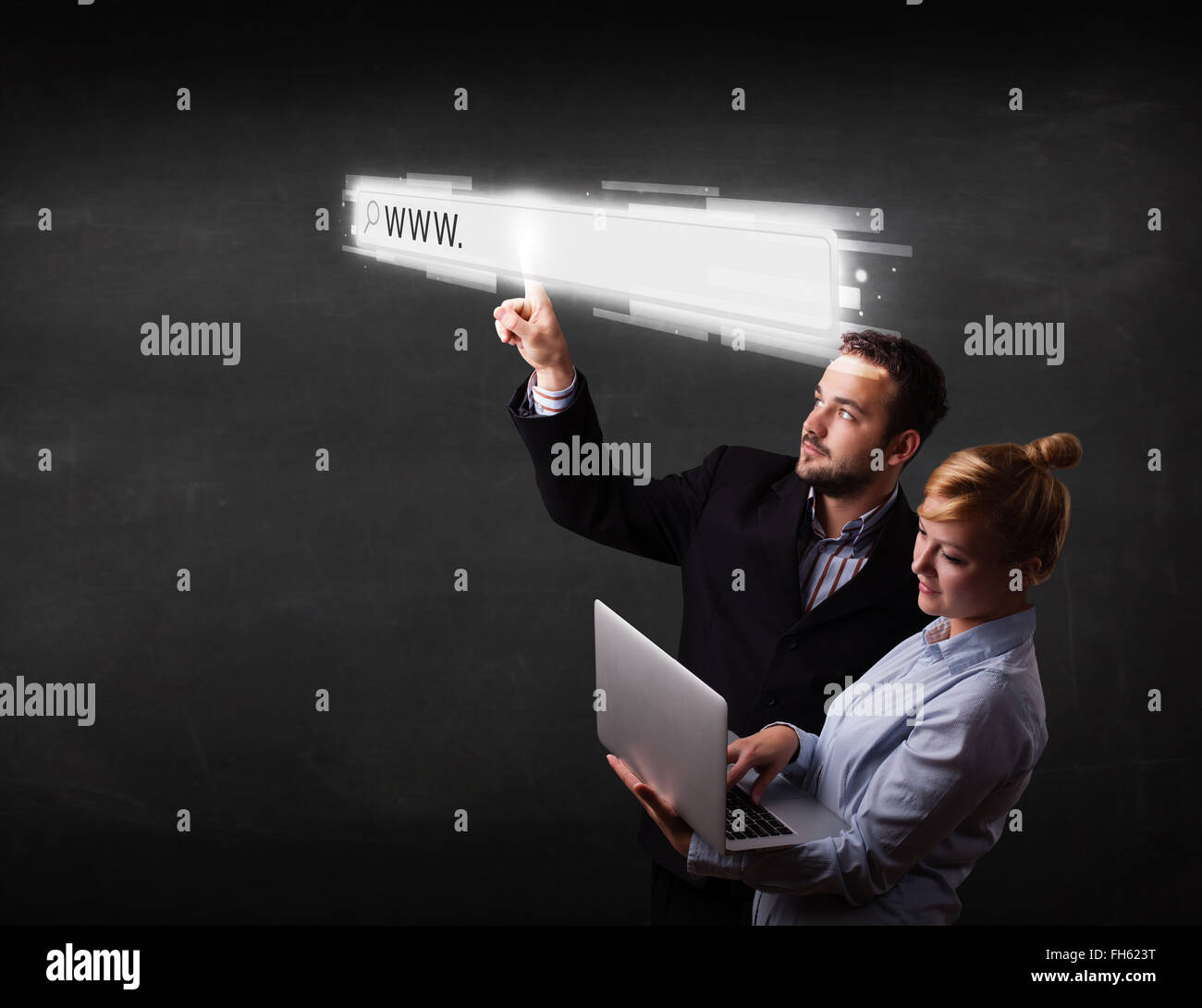 Young business couple touching web browser address bar with www sign ...