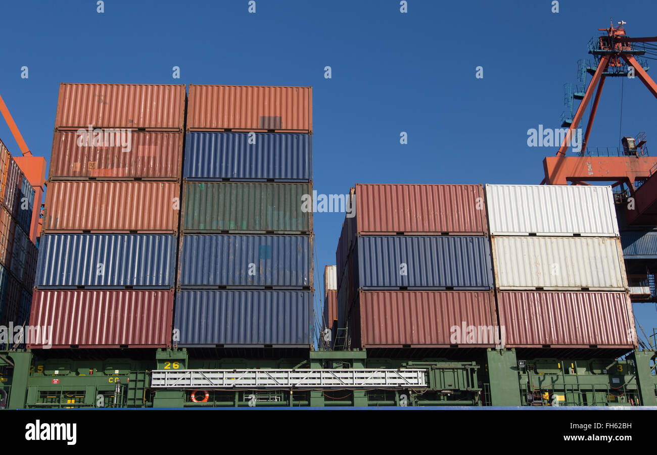 Container Ship is loading in a port Stock Photo - Alamy