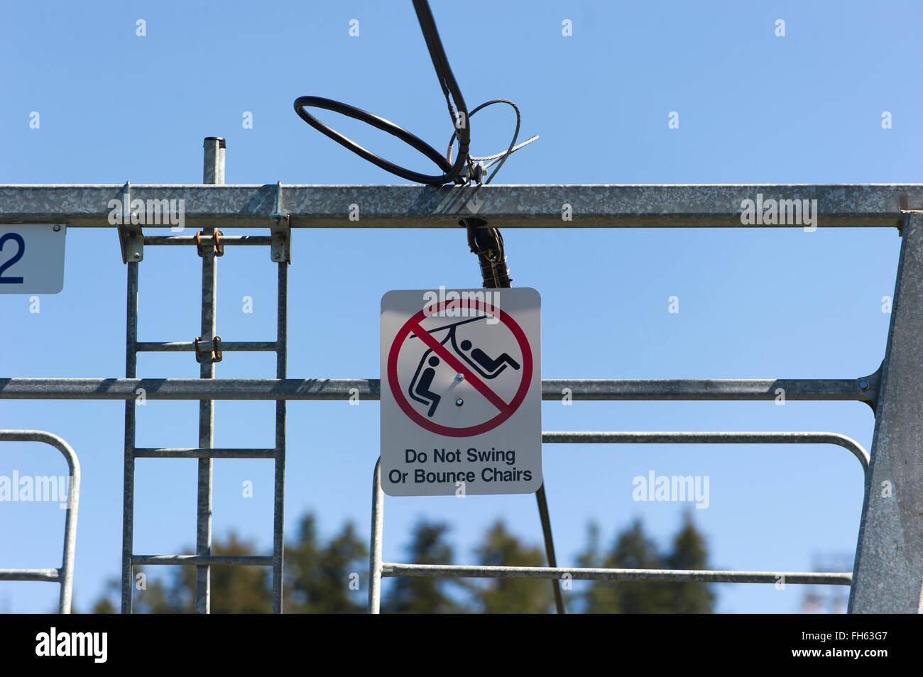 Chairlift warning sign Stock Photo - Alamy
