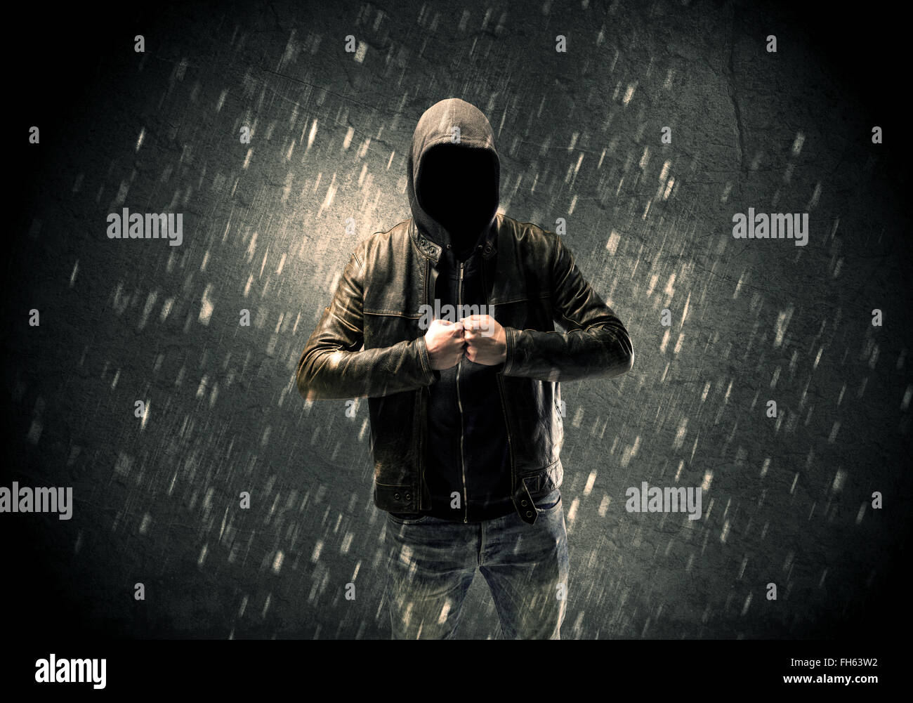 Unknown suspect standing in the dark Stock Photo - Alamy