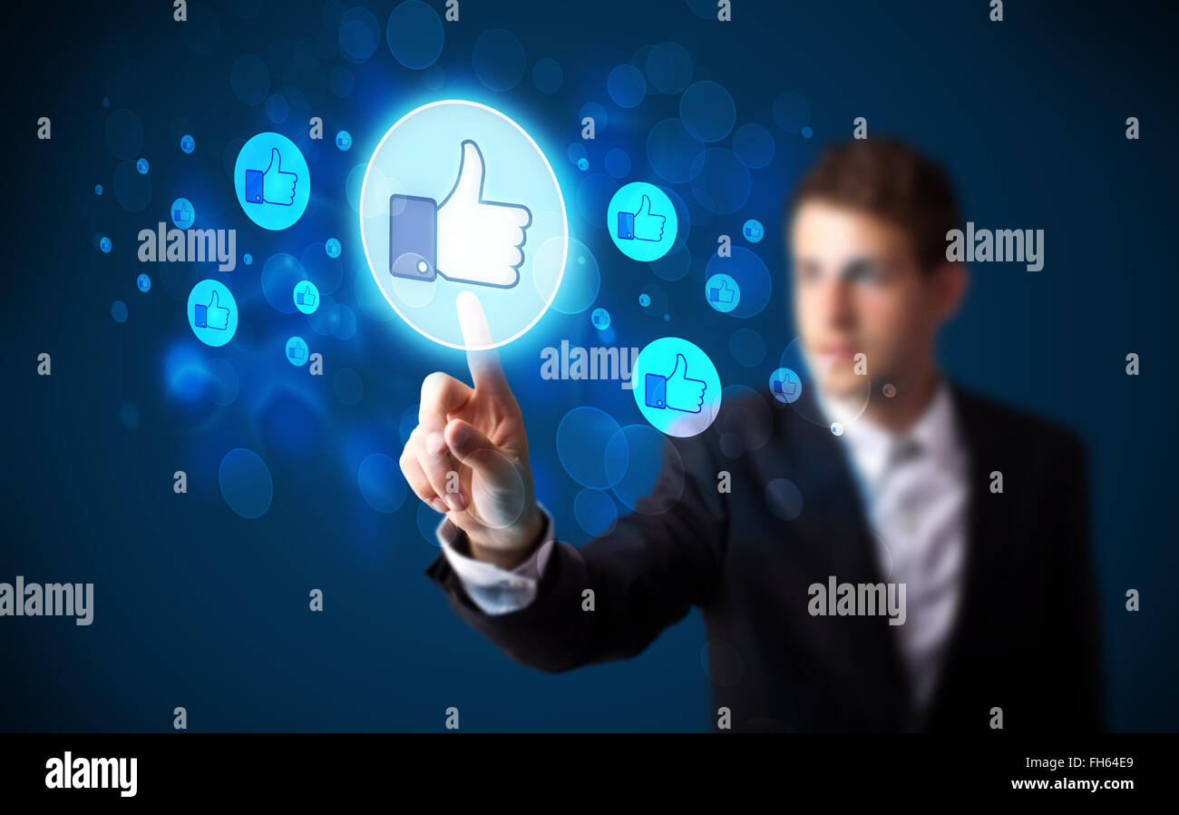 Handsome person pressing thumbs up button on modern social network ...