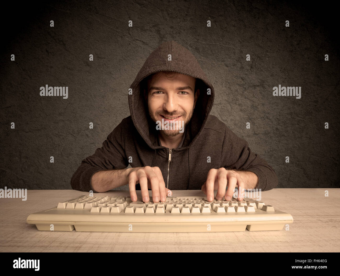 Computer geek typing on keyboard Stock Photo - Alamy
