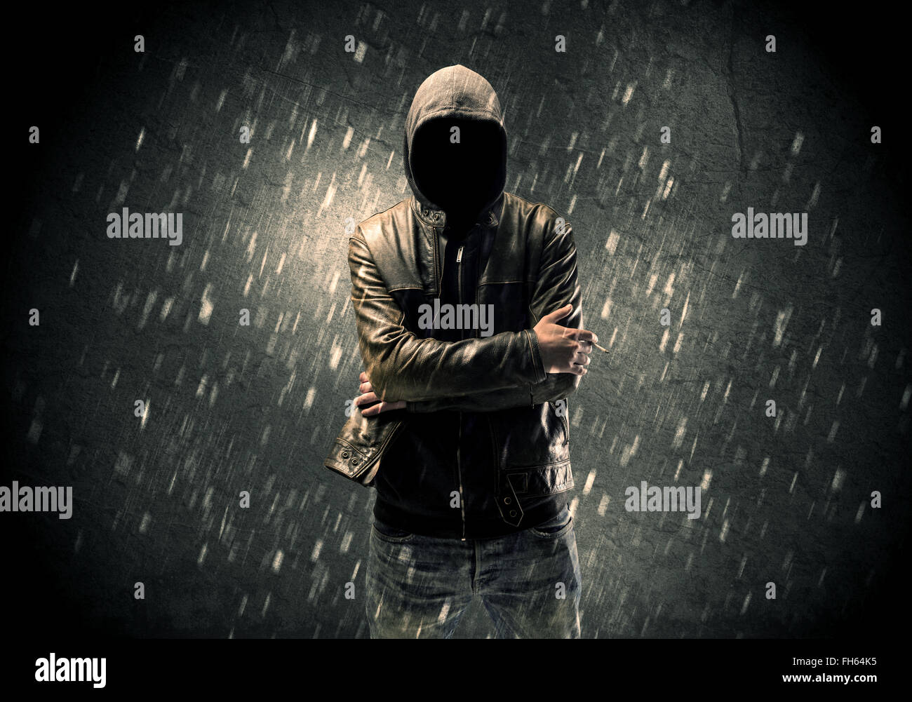 Unknown suspect standing in the dark Stock Photo - Alamy