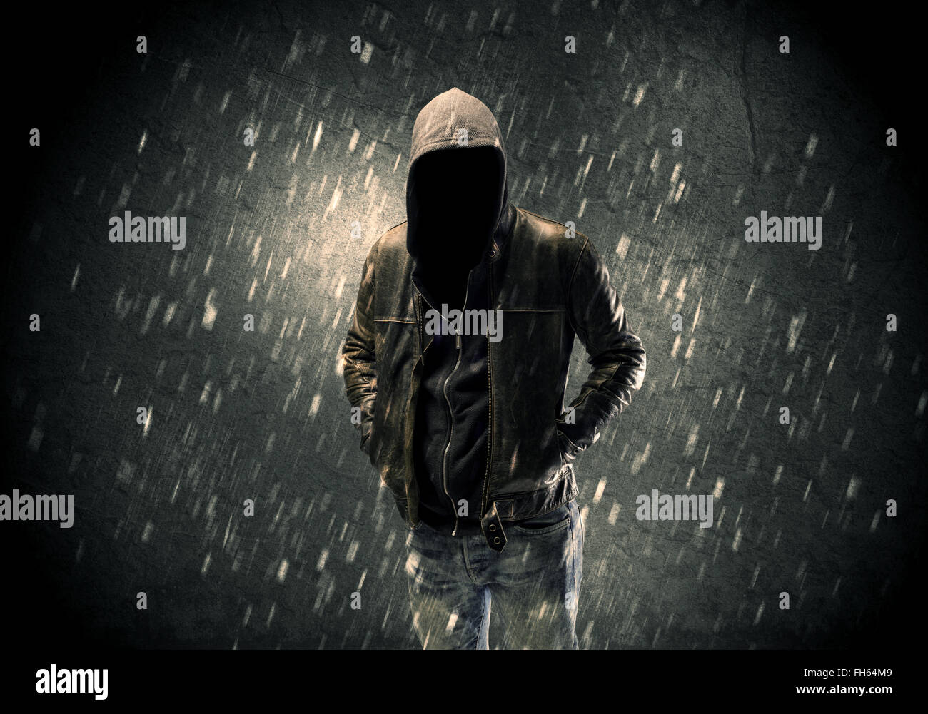 Unknown suspect standing in the dark Stock Photo - Alamy
